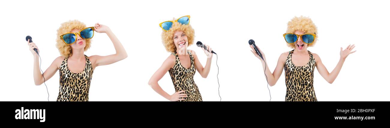 The funny singer woman with mic and sunglasses isolated on white Stock ...
