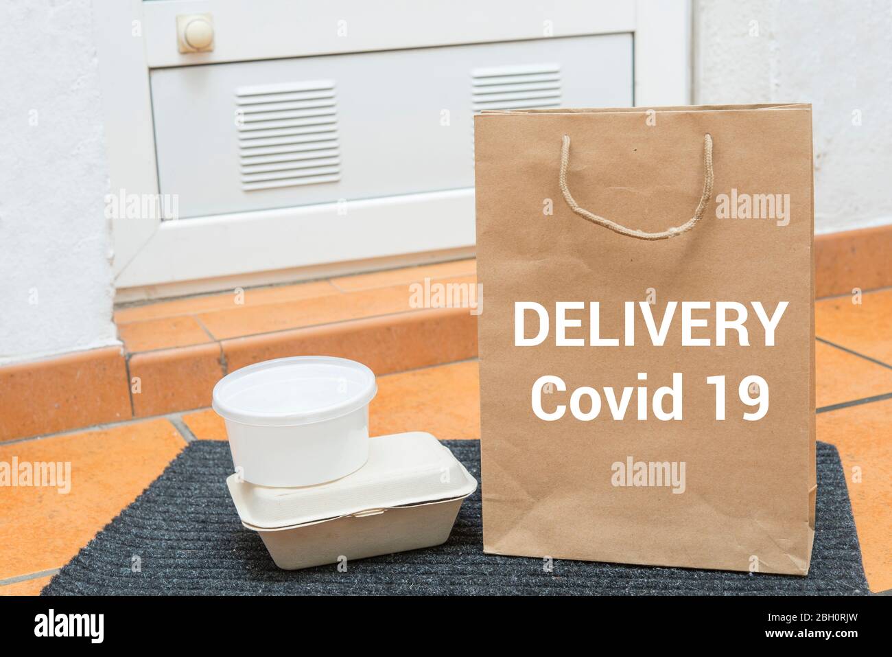 home delivery service, boxes standing by the house doors Stock Photo ...