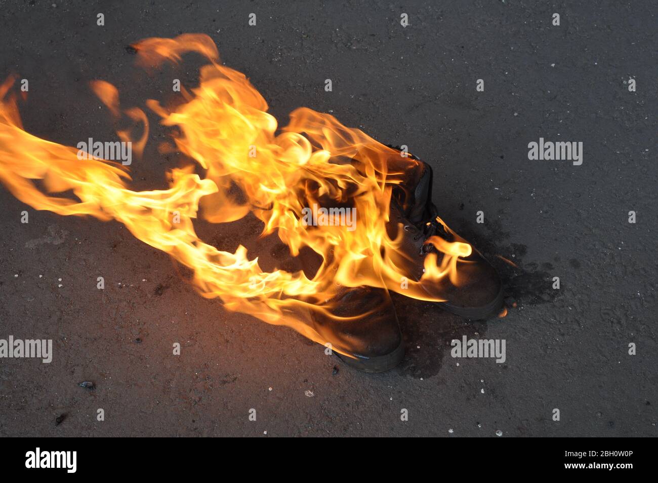 Burning shoes hi-res stock photography and images - Alamy