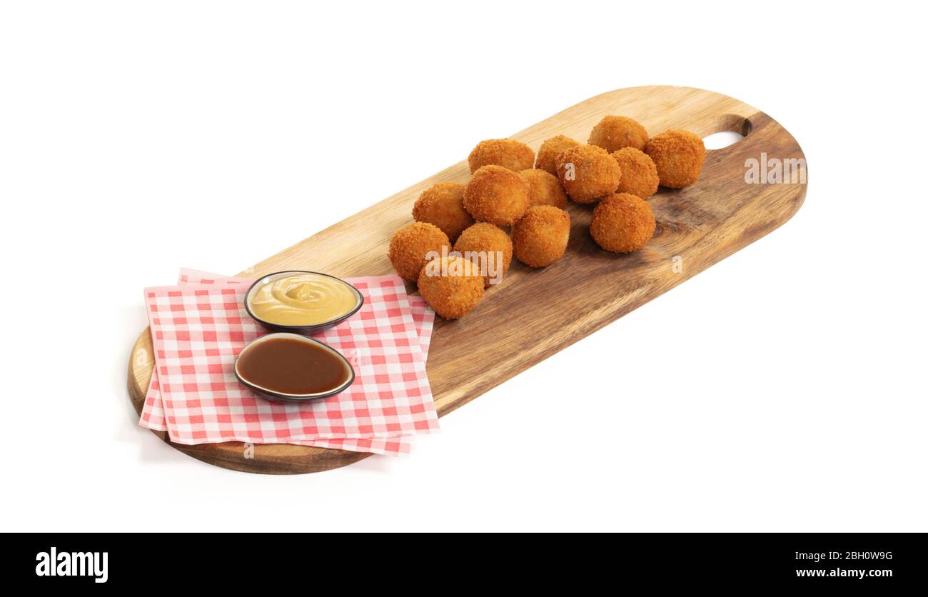 Dutch traditional snack bitterbal on a serving board, isolated Stock ...