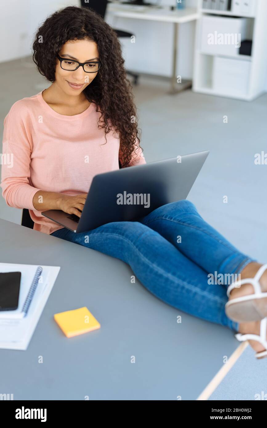 Woman relaxed feet up hi-res stock photography and images - Alamy