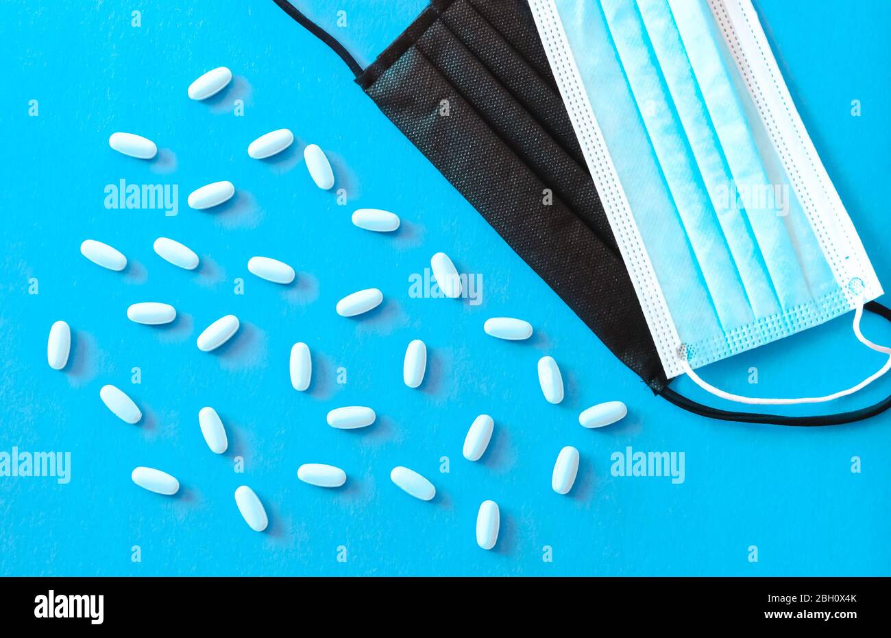 Face masks and pills Stock Photo - Alamy