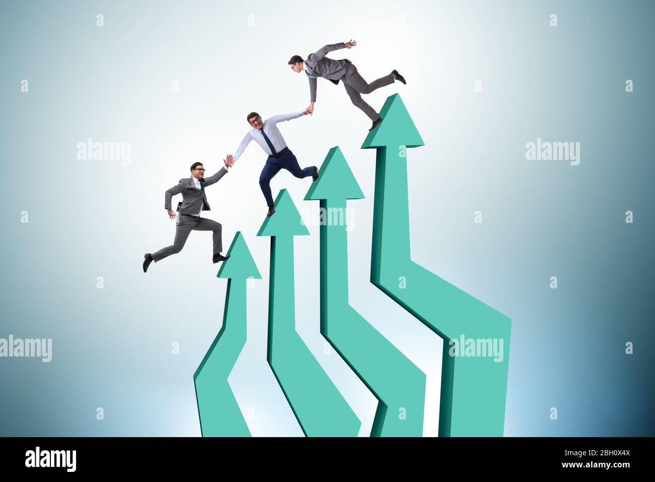 Colleagues helping each other to improve the results Stock Photo - Alamy