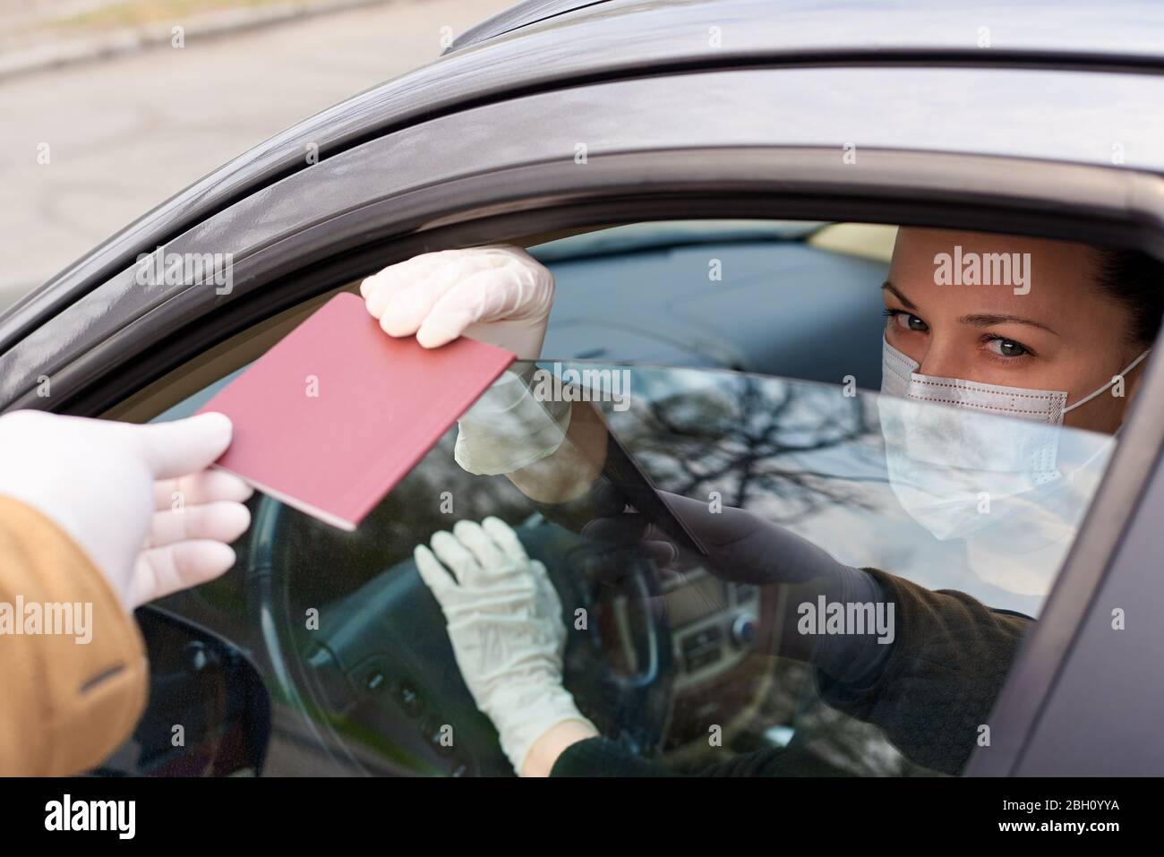 Policeman checking identification hi-res stock photography and images ...