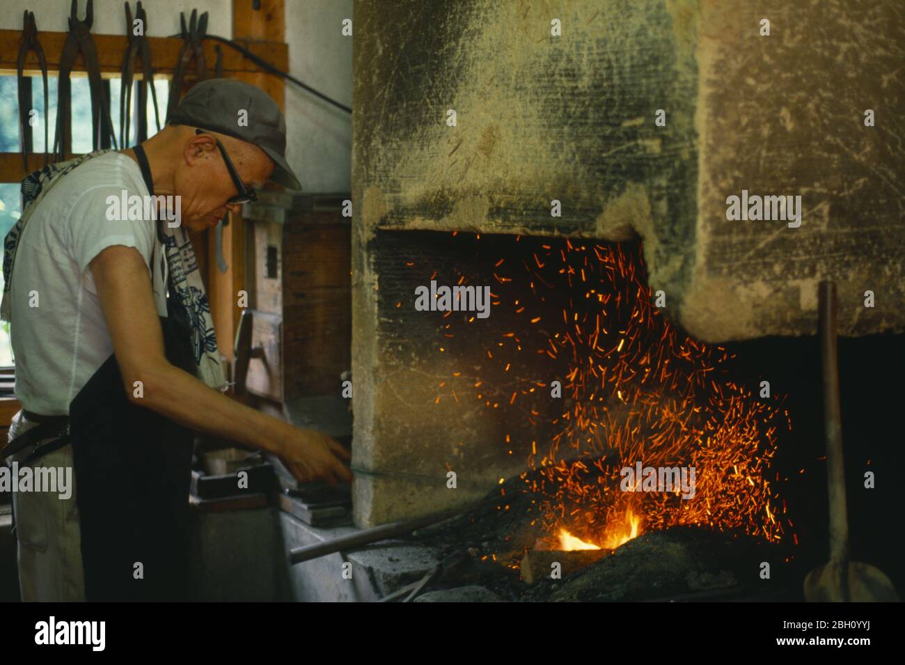 Japan, Work, Traditional Blacksmith at work Stock Photo - Alamy