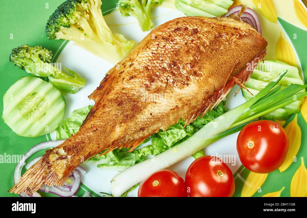 Zamin Doz - whole fish is stuffed with spices Stock Photo - Alamy