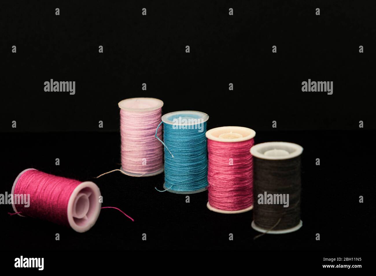 Colorful spools of thread Stock Photo - Alamy