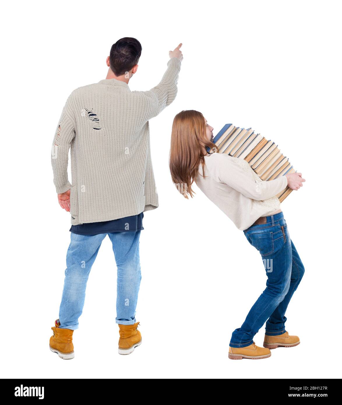 Back view of couple in sweater pointing. Rear view people collection ...