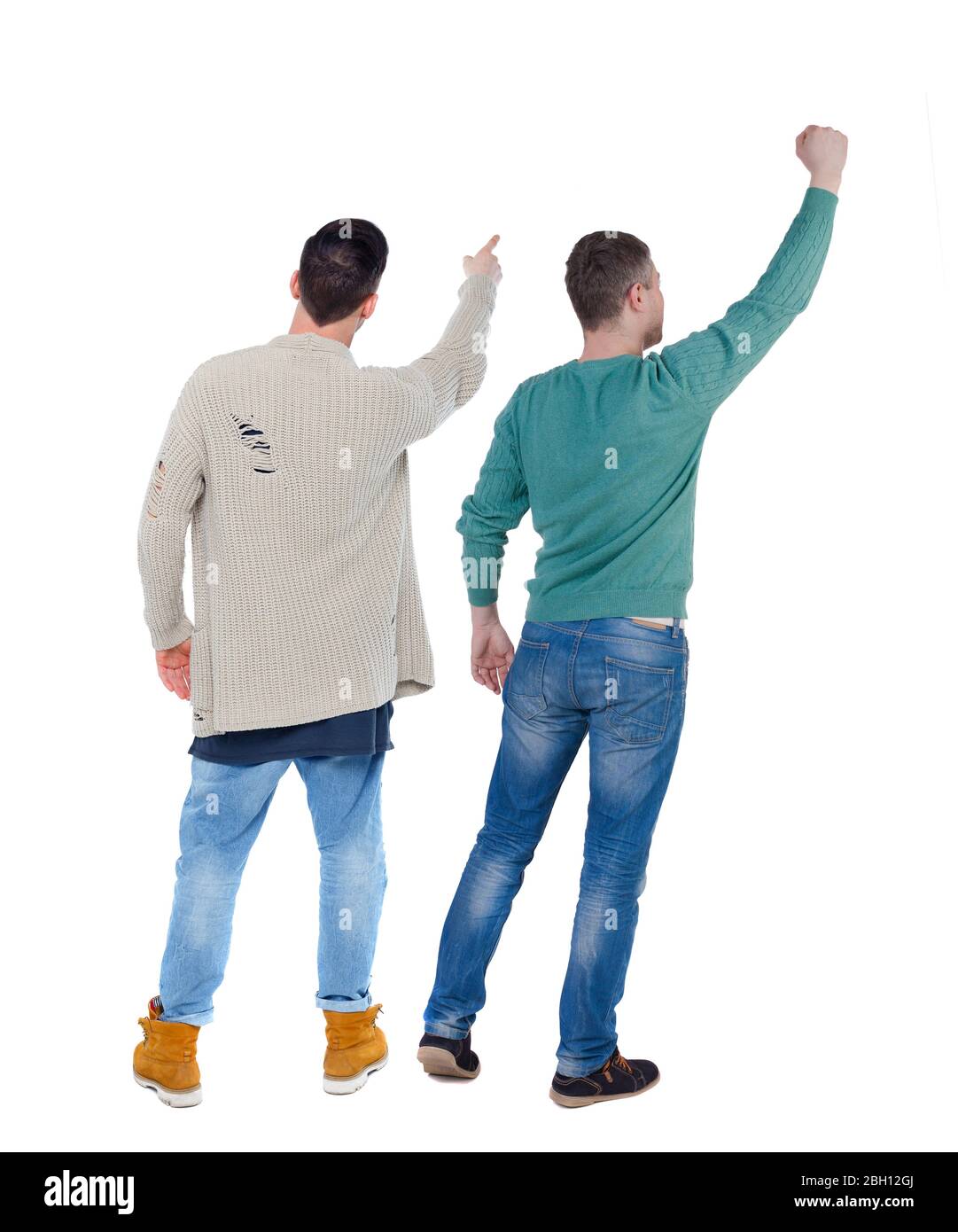 Back view of two man in sweater pointing. Rear view people collection ...