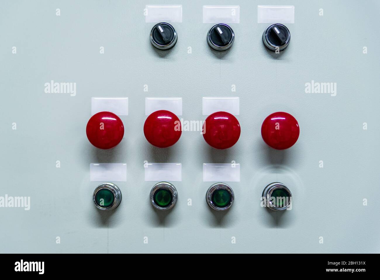 Control panel with red and black buttons. Equipment start and shutdown ...