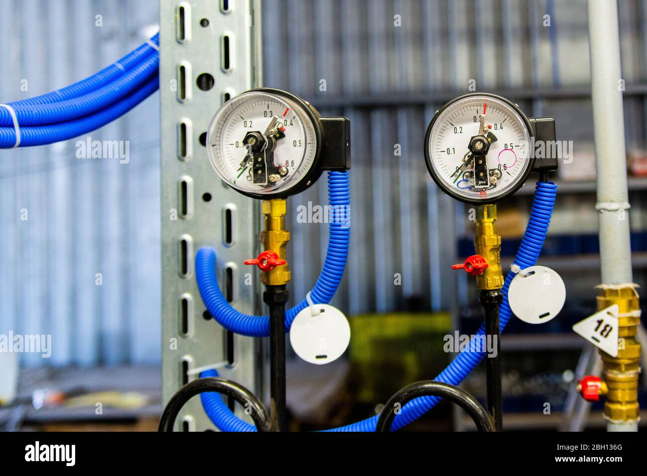 Industrial equipment with pressure gauge meters. Selective focus Stock ...