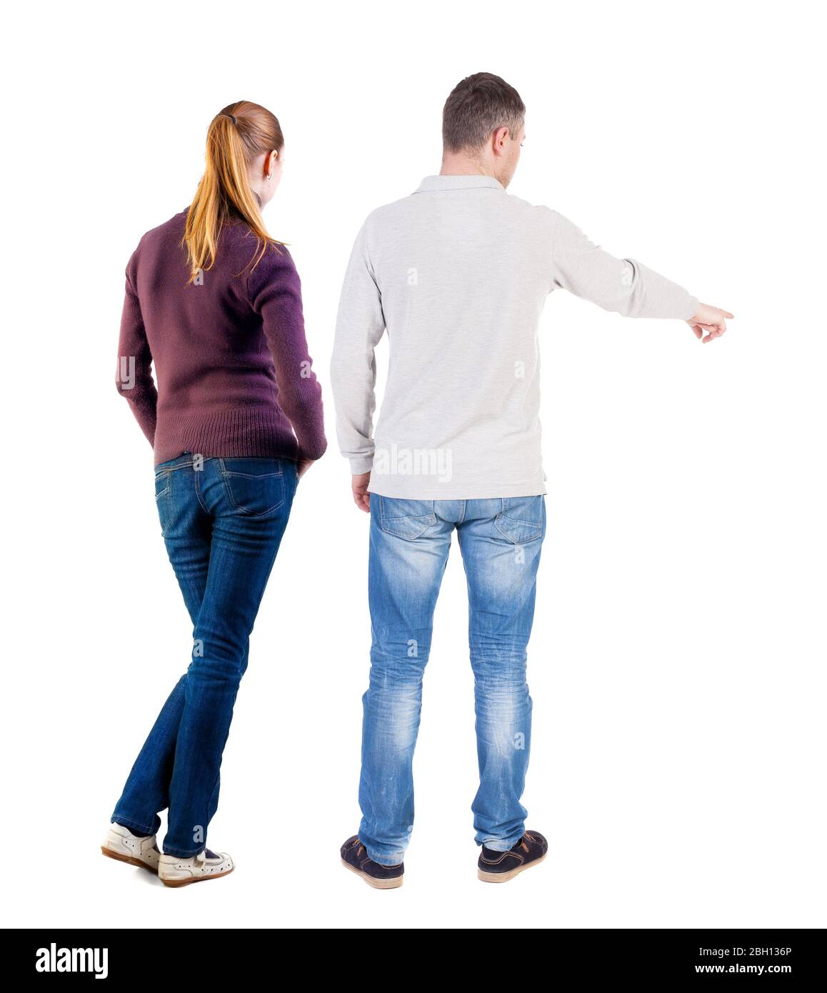 Back view of couple in sweater pointing. Rear view people collection ...