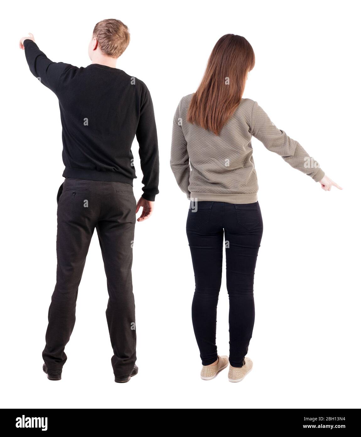 Back view of couple in sweater pointing. Rear view people collection ...