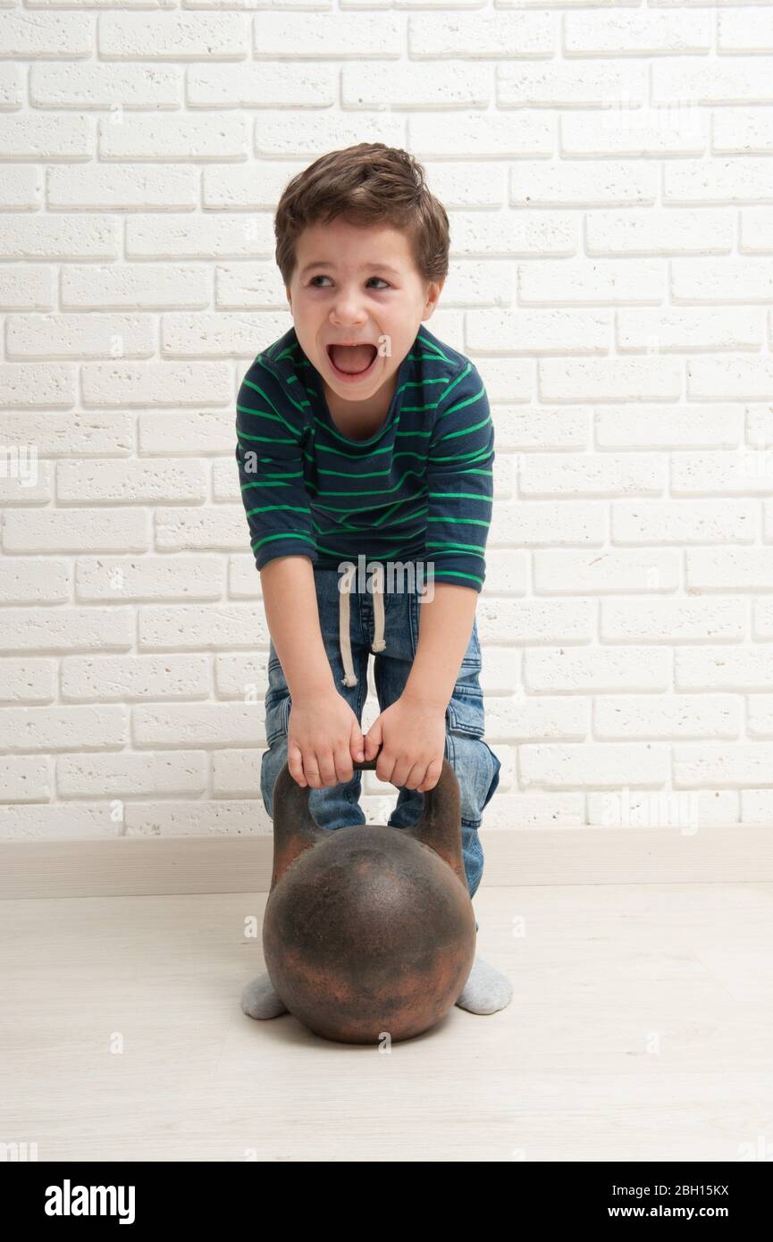 Child lift weight hi-res stock photography and images - Alamy