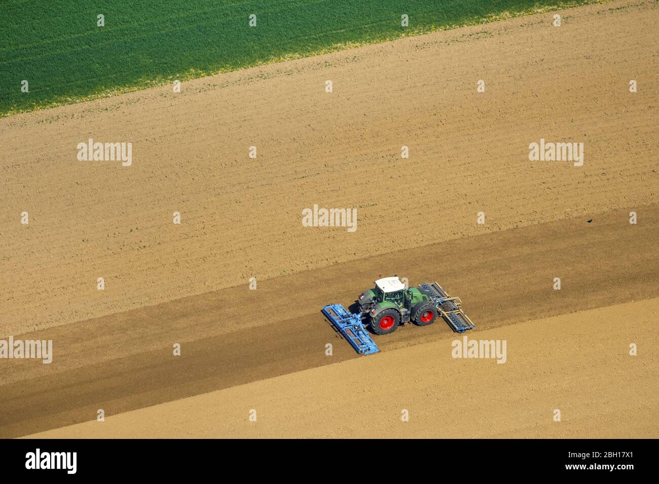 , Structures on harrowing and seeding agricultural fields in Linnich ...