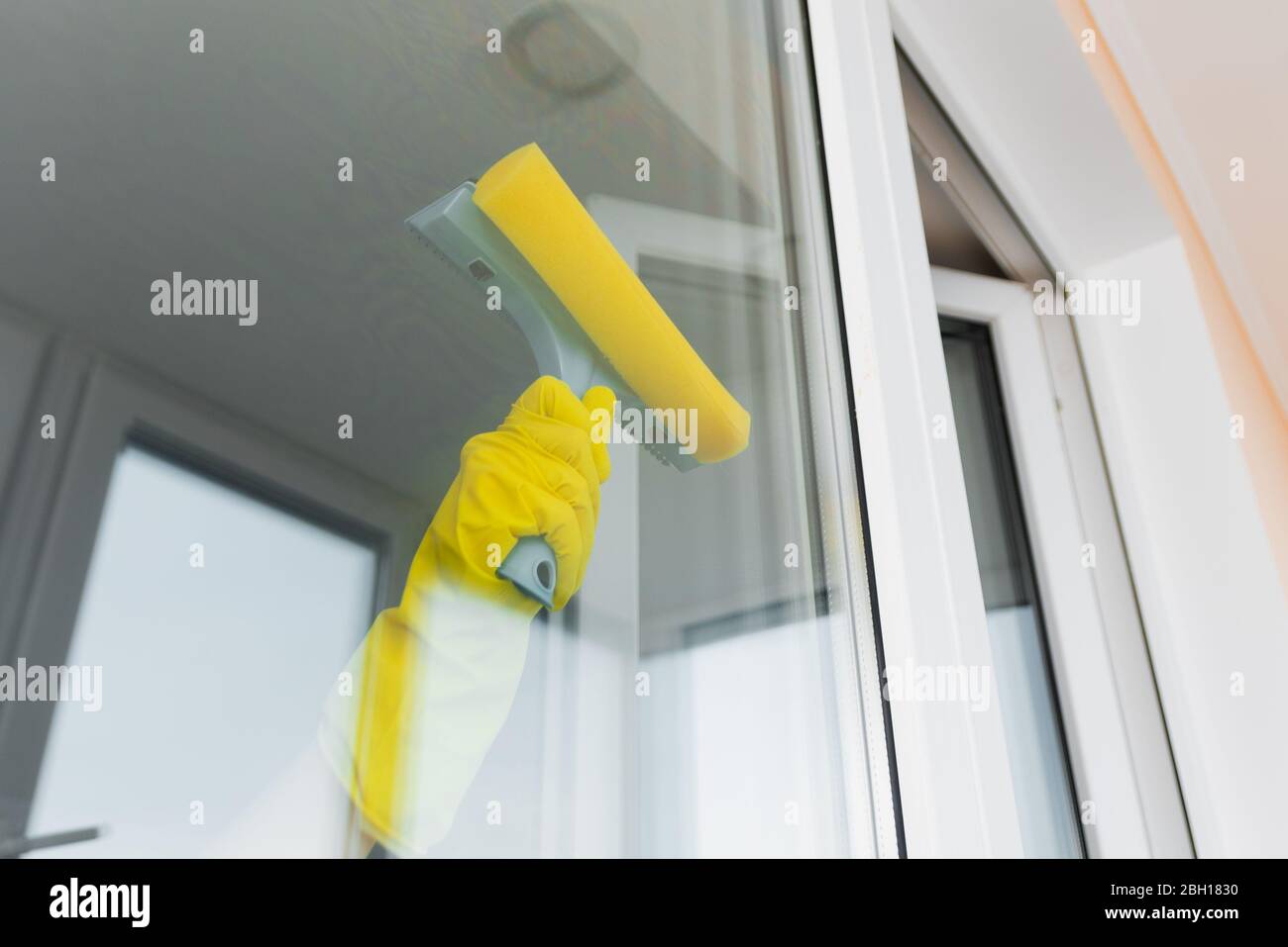 Person washing cleaning windows hi-res stock photography and images - Alamy
