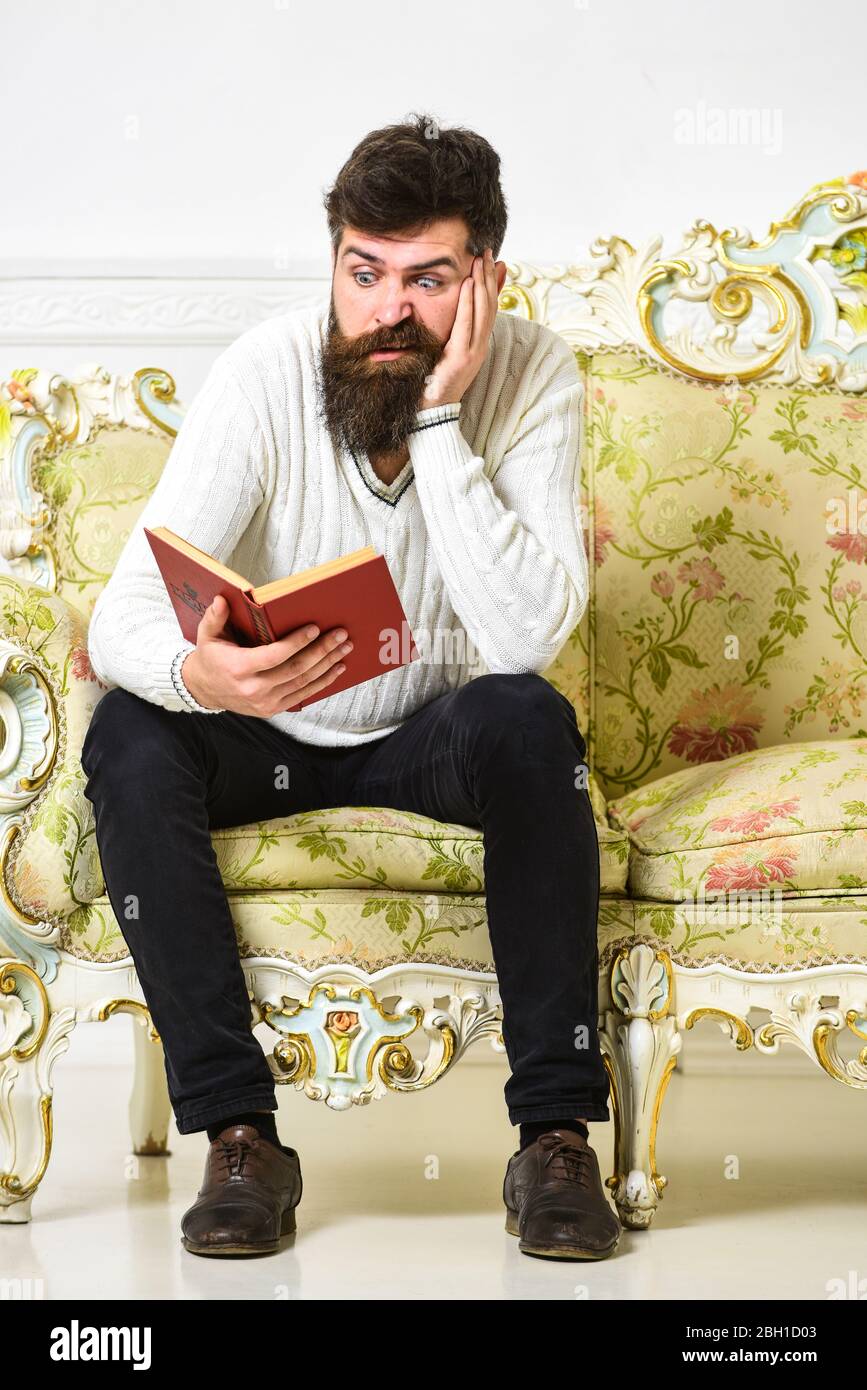 Macho on disgusted face reading book. Scandalous bestseller concept ...