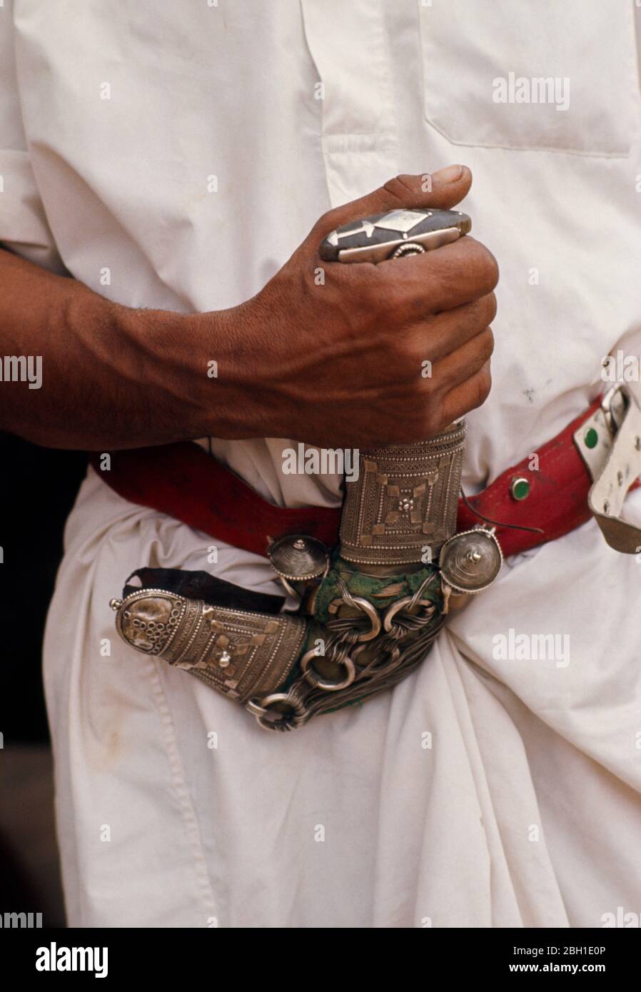 Qatar, Bedouin mans hand holding his dagger Stock Photo - Alamy