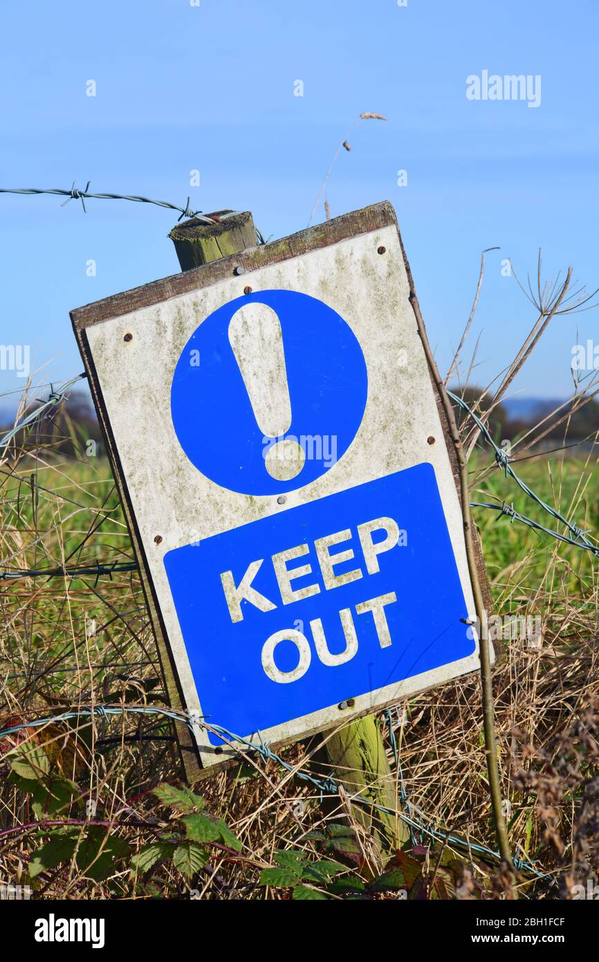 keep out warning sign in countryside united kingdom Stock Photo - Alamy