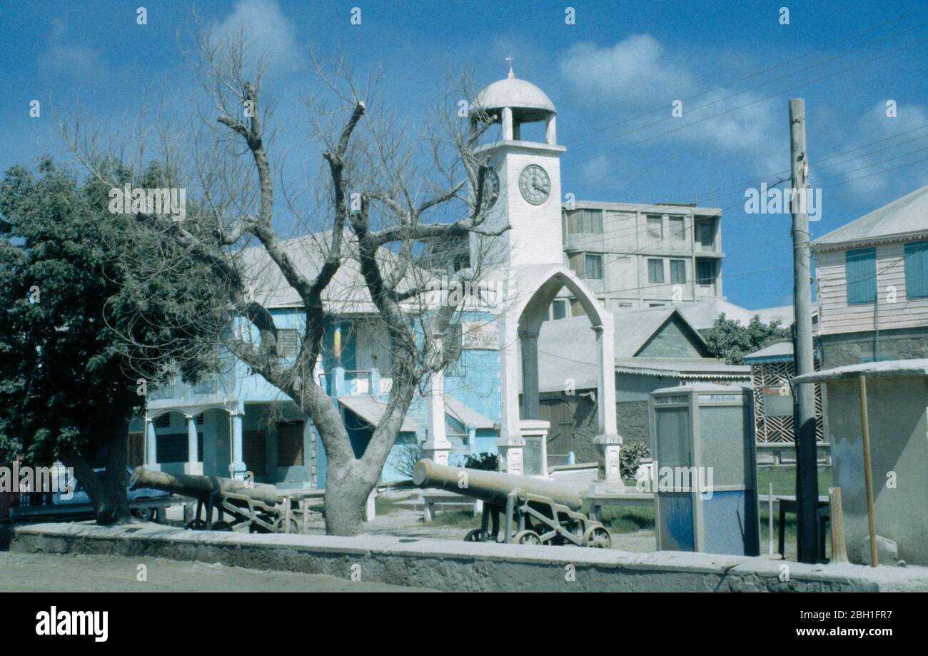 West Indies, Monserrat, Plymouth, Town buildings covered in layer of ...