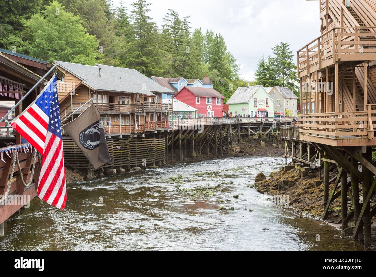 Alaskan buildings in Ketchikan overlooking a salmon stream Stock Photo ...
