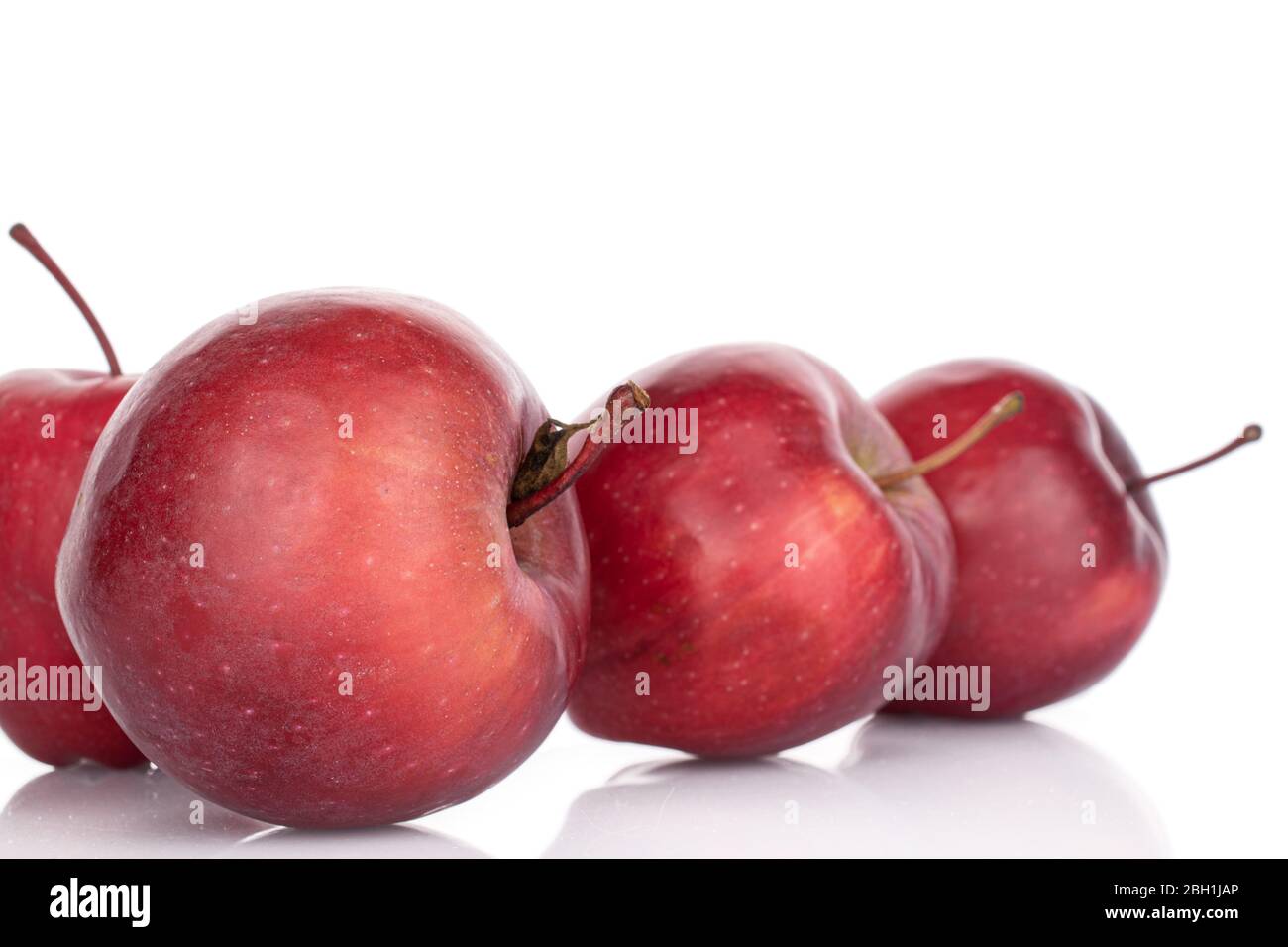 Group of four whole red delicious apple isolated on white Stock Photo ...