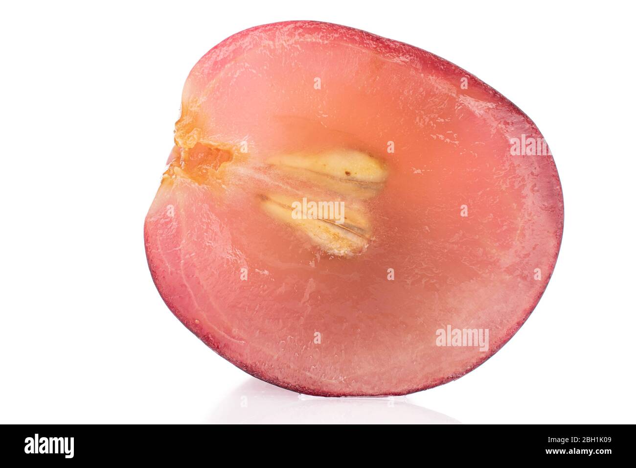 One half of fresh red globe grape cross section isolated on white Stock ...