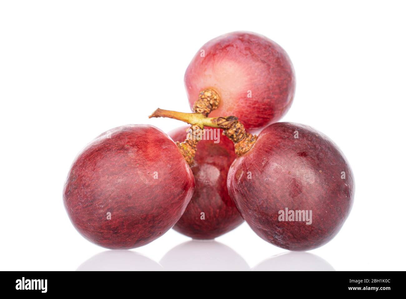 Group of four whole fresh red globe grape isolated on white Stock Photo ...