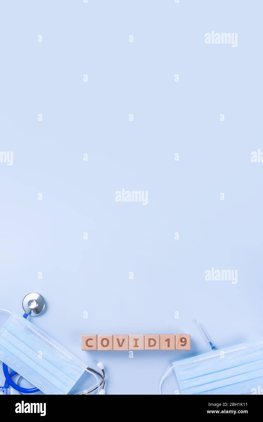 COVID-19 word wooden cube with mask, medical equipment, world disease ...