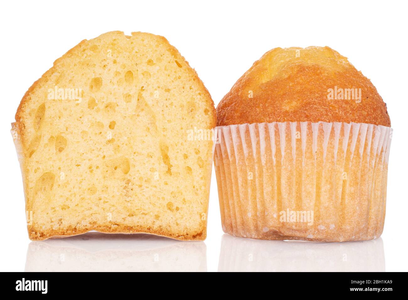 Group of one whole one half of small baked muffin isolated on white ...
