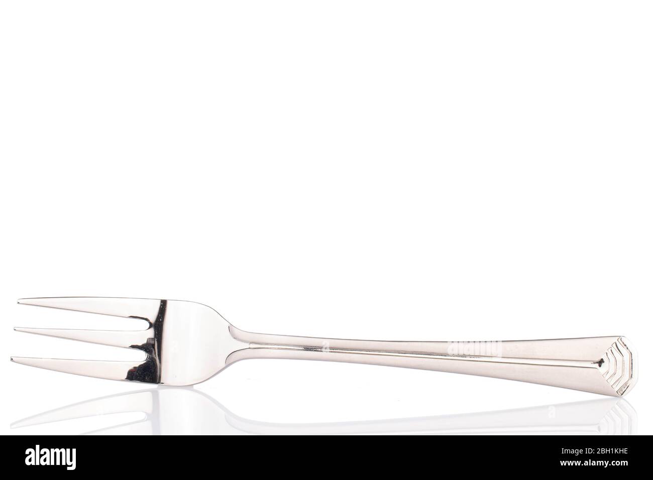 One whole fork isolated on white Stock Photo - Alamy