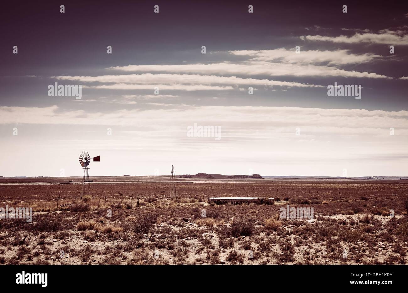 View of Windmill Wind pump on a farm in rural Karoo area of South ...