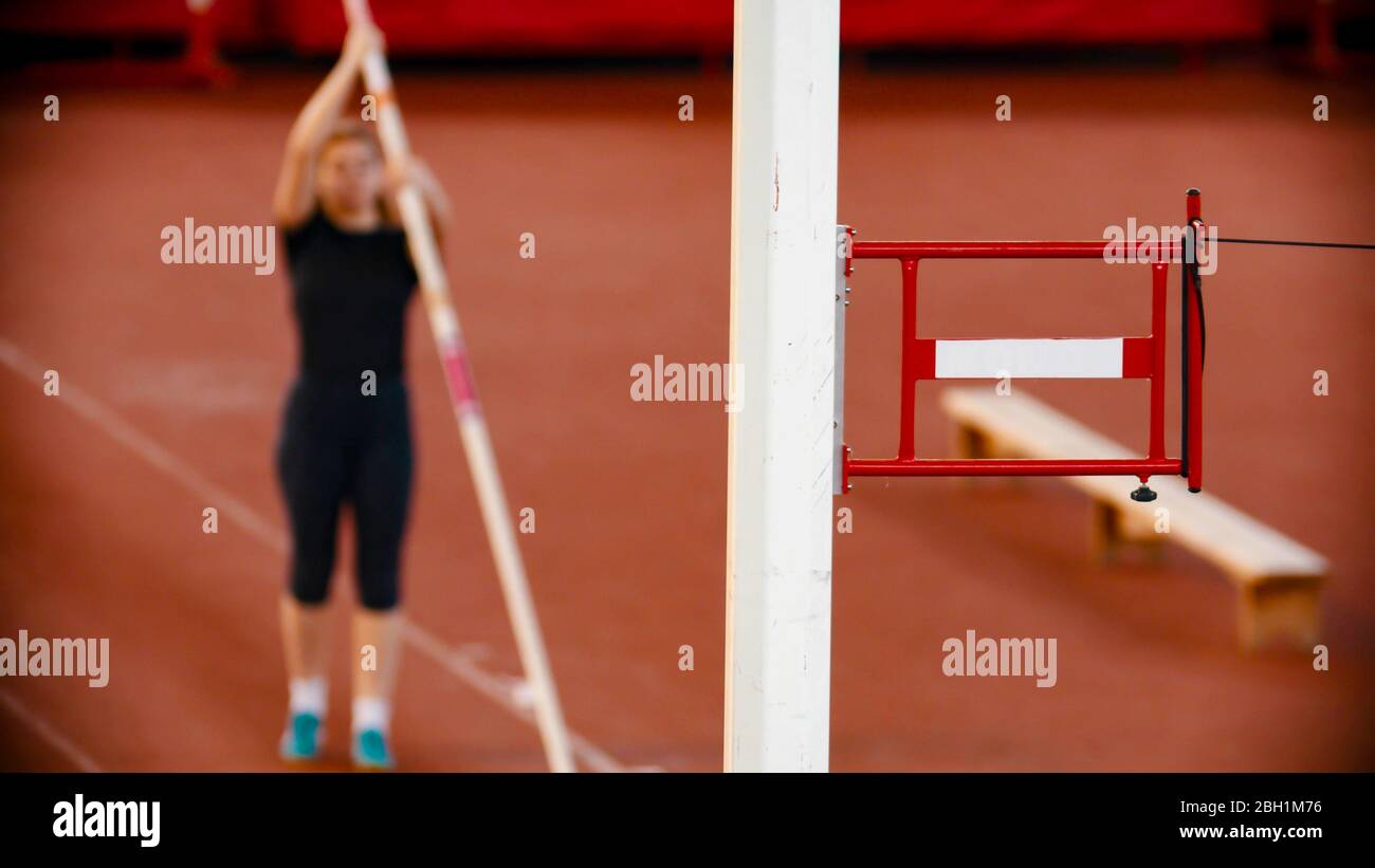 Pole vault training on the stadium - mounting stand. Mid shot Stock ...