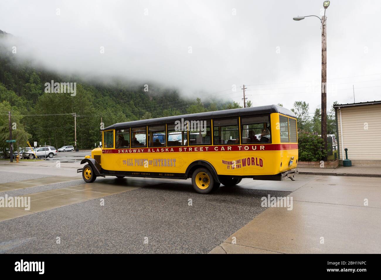 Yellow Sightseeing Bus in Skagway, Alaska. North to Alaska Stock Photo ...