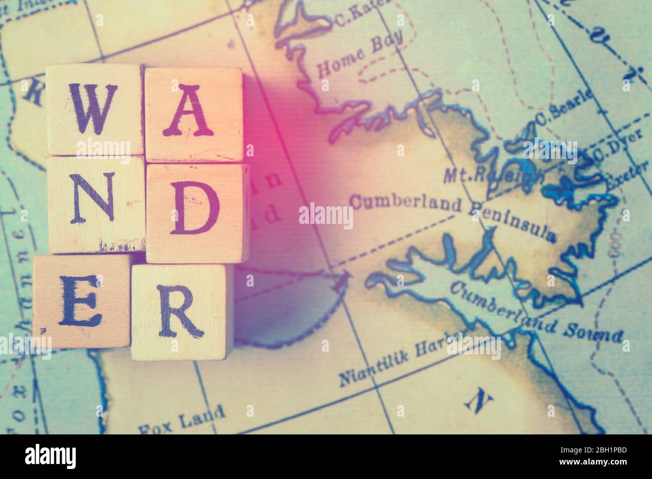 Wander word written in wooden blocks on a vintage travel map Stock ...