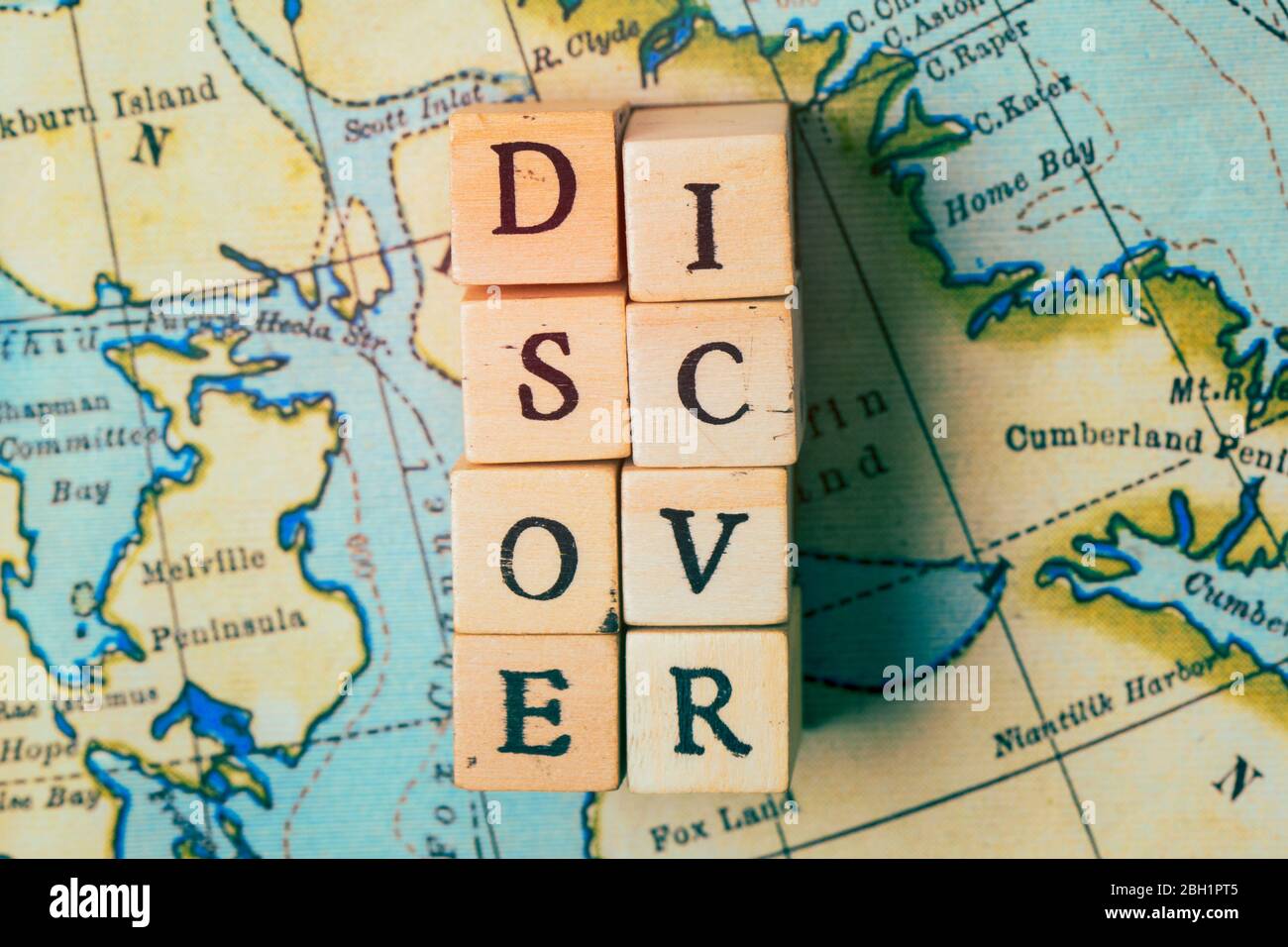 Discover word written in wooden blocks on a vintage travel map Stock ...