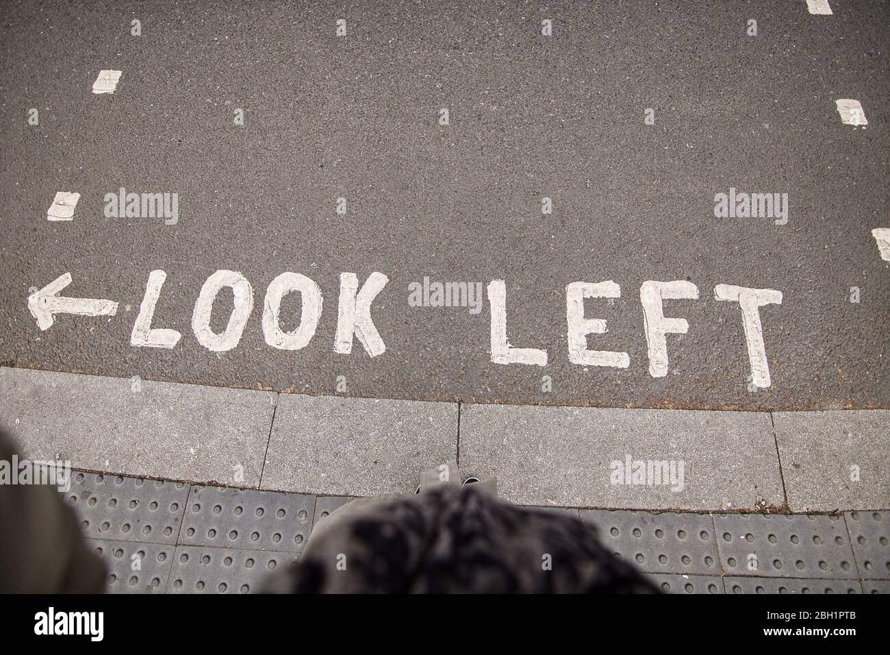 Pedestrian crossing look left sign hi-res stock photography and images ...