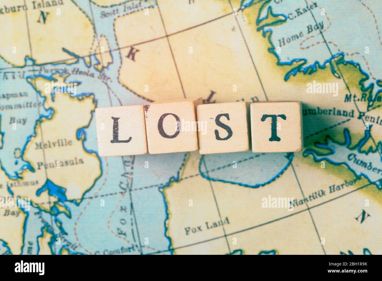 Lost word written in wooden blocks on a vintage travel map Stock Photo ...