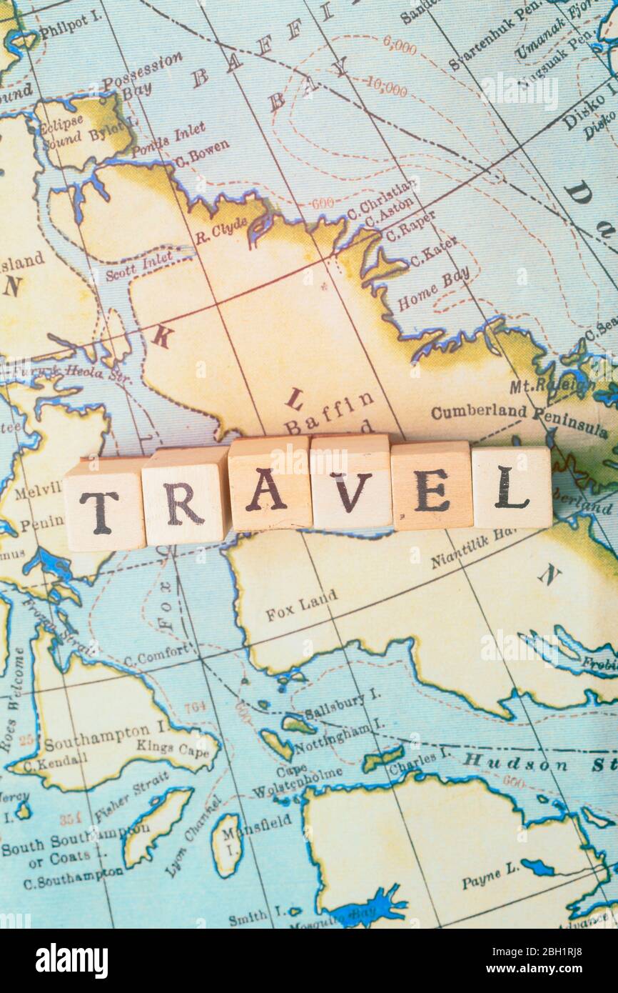 Travel word written in wooden blocks on a vintage travel map Stock ...