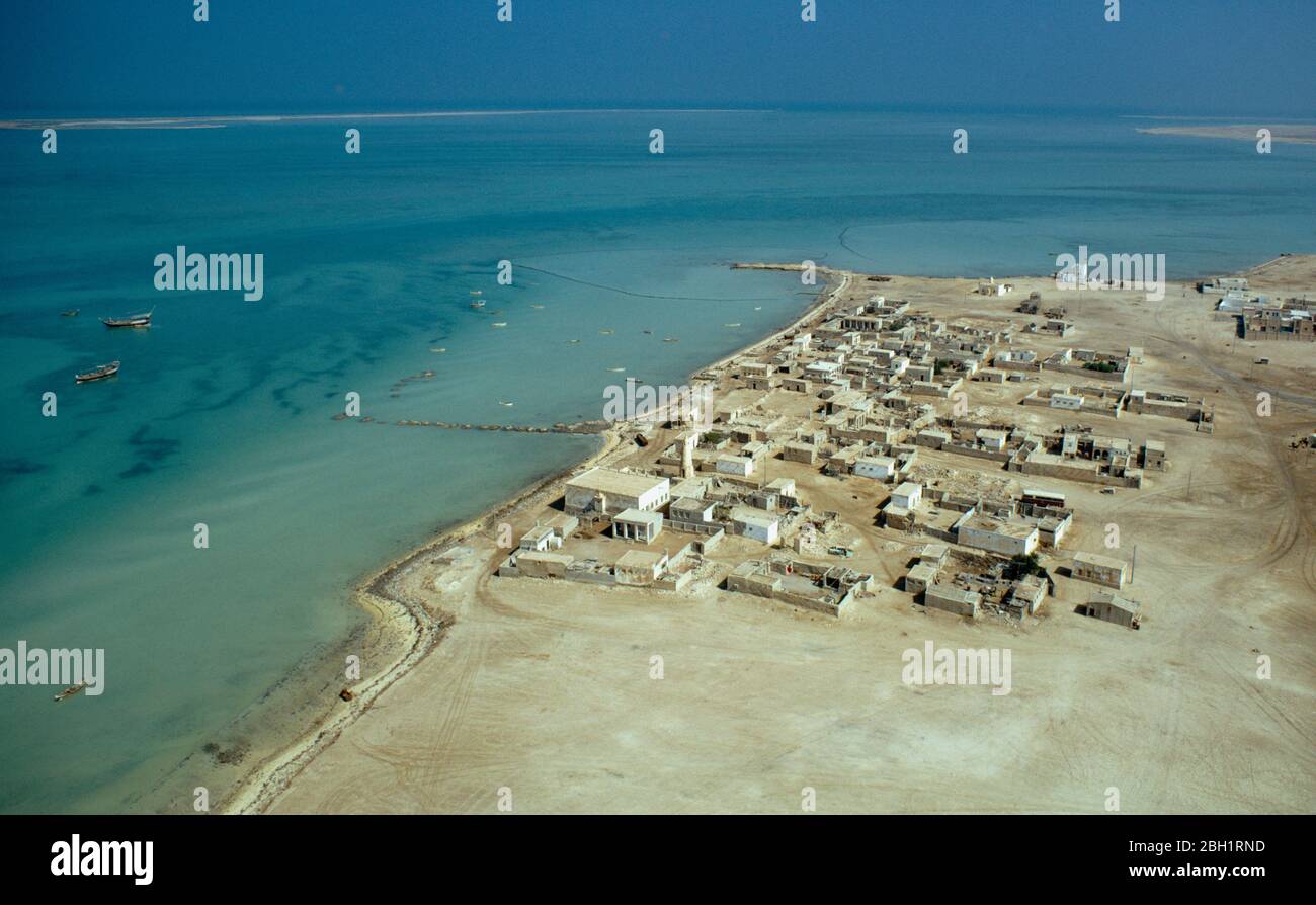 Qatar, Ruwais, Coastal town with the Gulf sea beyond Stock Photo - Alamy