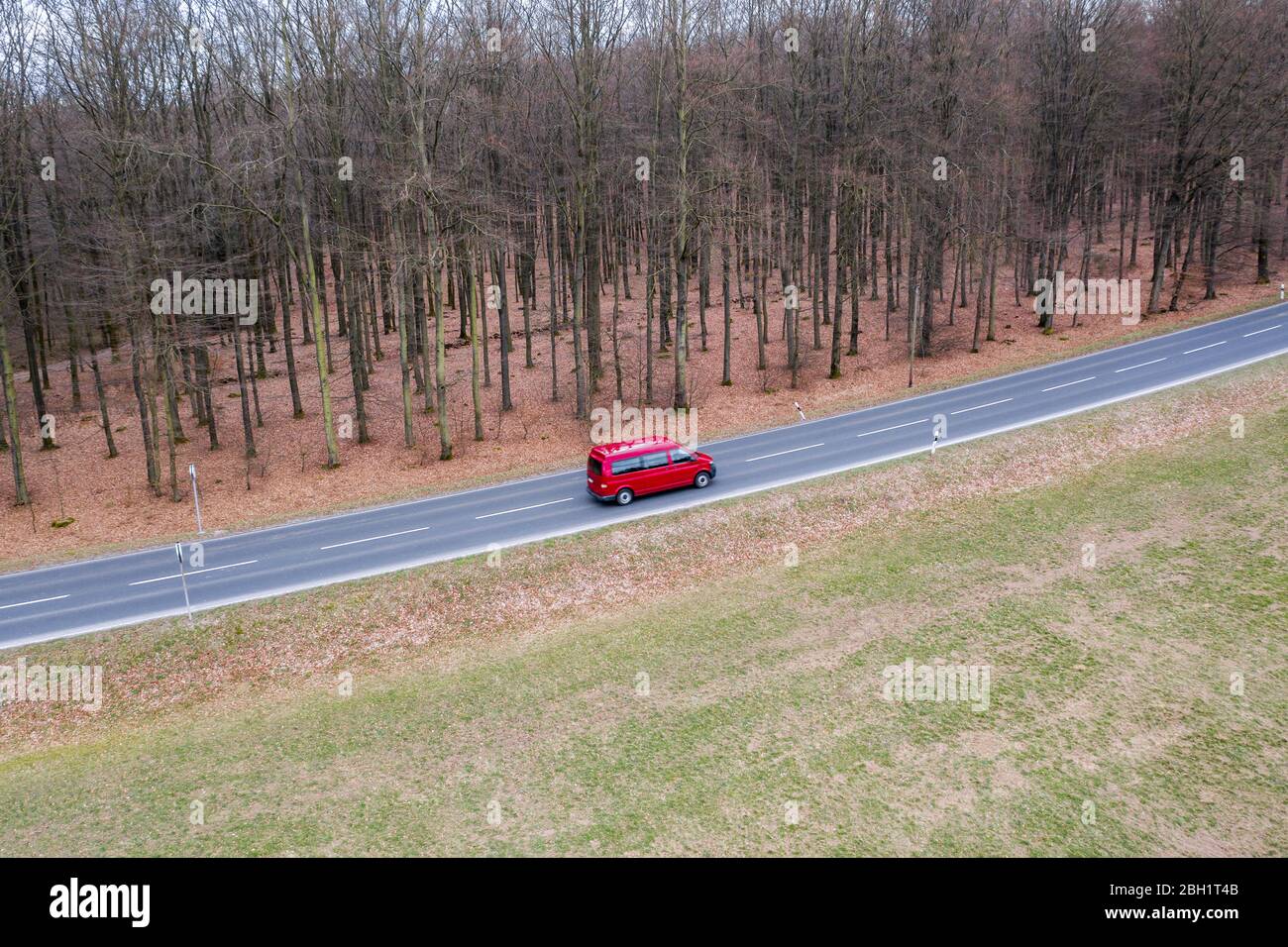 a red car on a street from above Stock Photo - Alamy