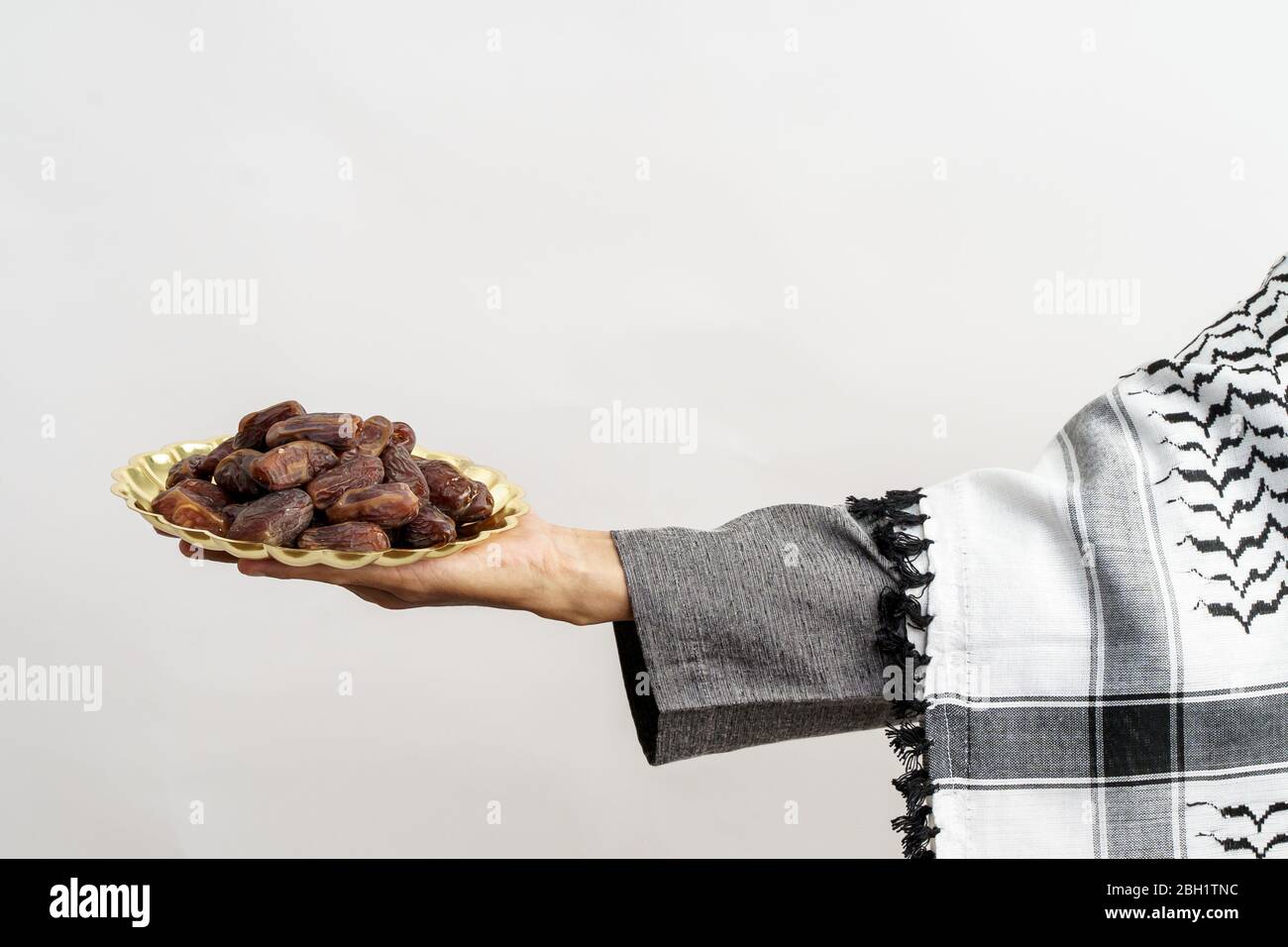 hand close up holding dates fruit on white. ramadan fruit Stock Photo ...