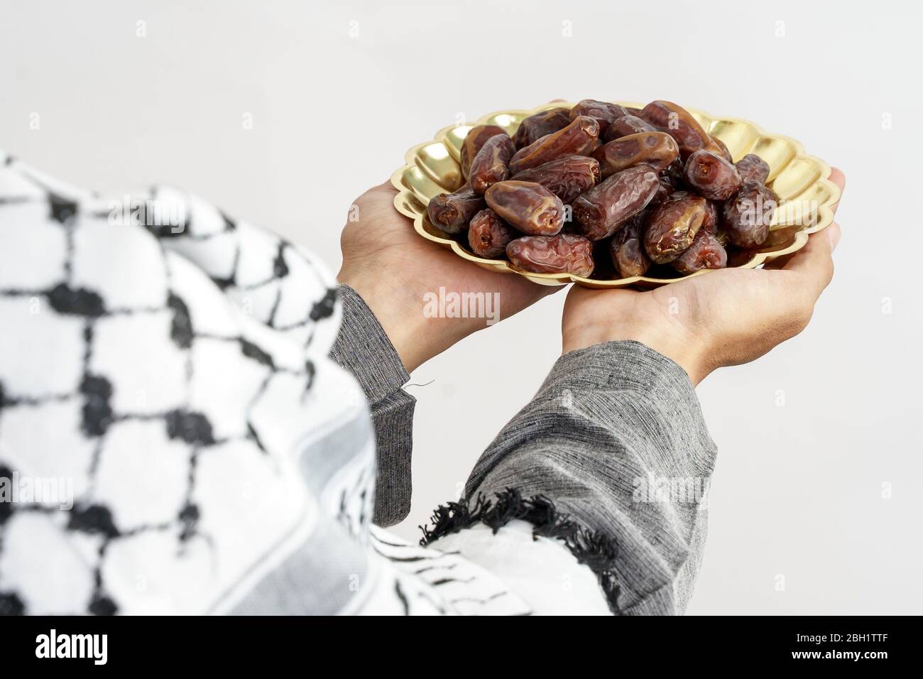 hand close up holding dates fruit on white. ramadan fruit Stock Photo ...