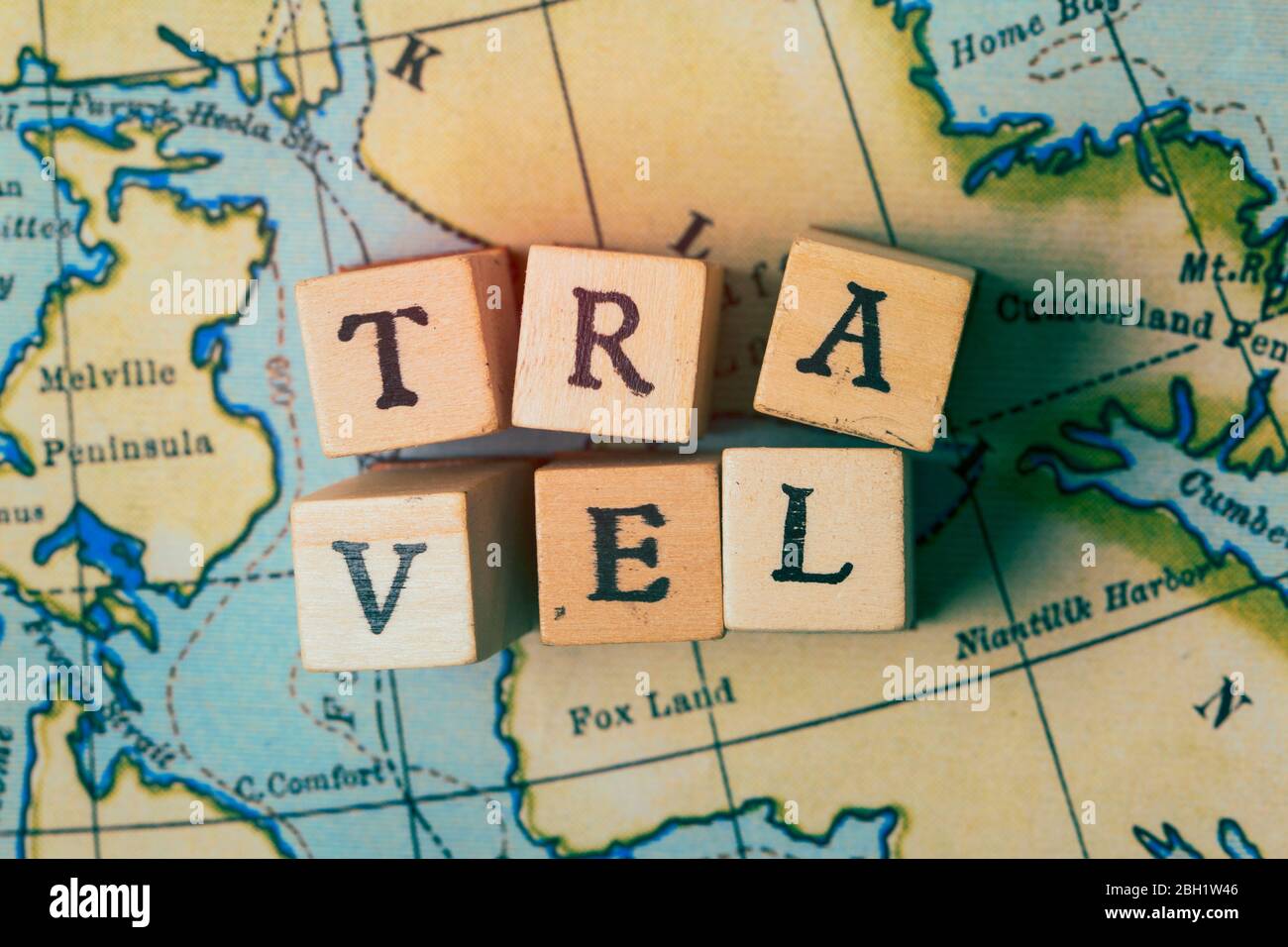 Travel word written in wooden blocks on a vintage travel map Stock ...