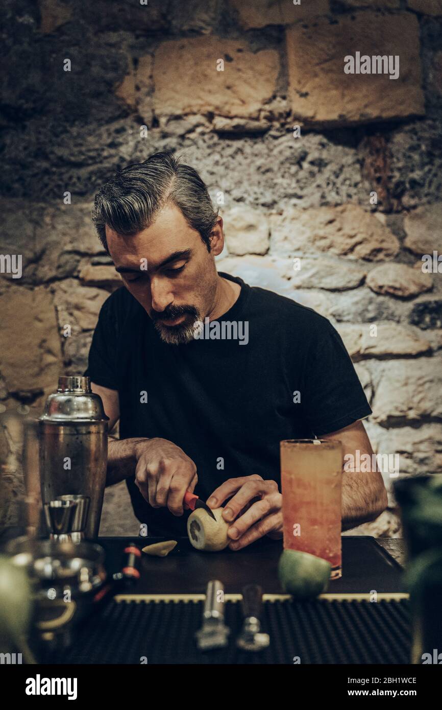 Bartender mixing cocktail ice hi-res stock photography and images - Alamy