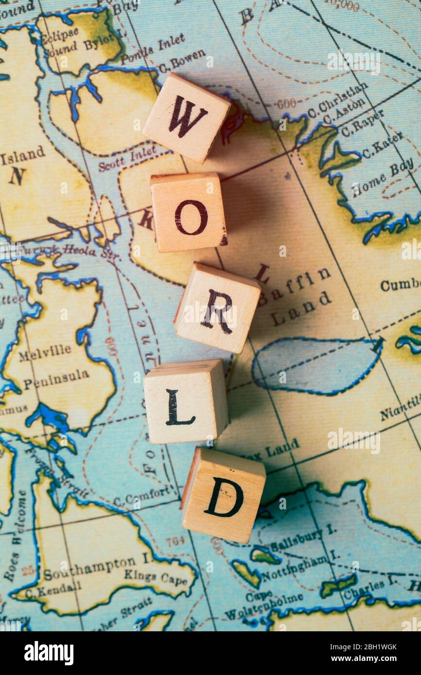 World word written in wooden blocks on a vintage travel map Stock Photo ...