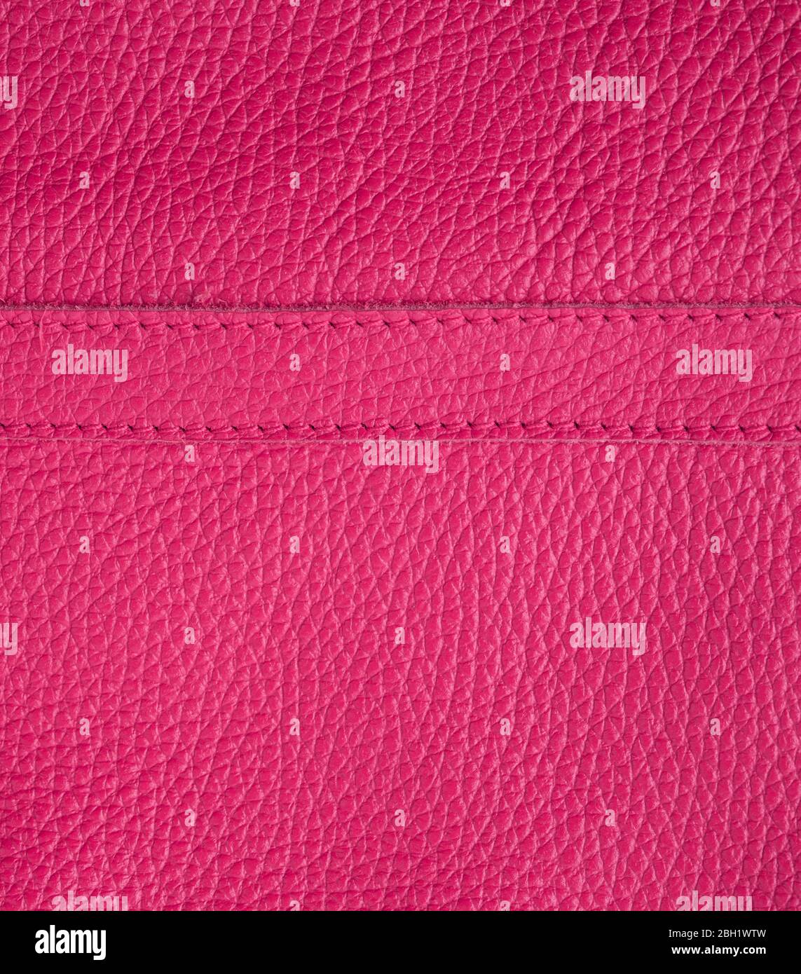 natural bright pink cowhide texture, full frame, scarlet color, close ...