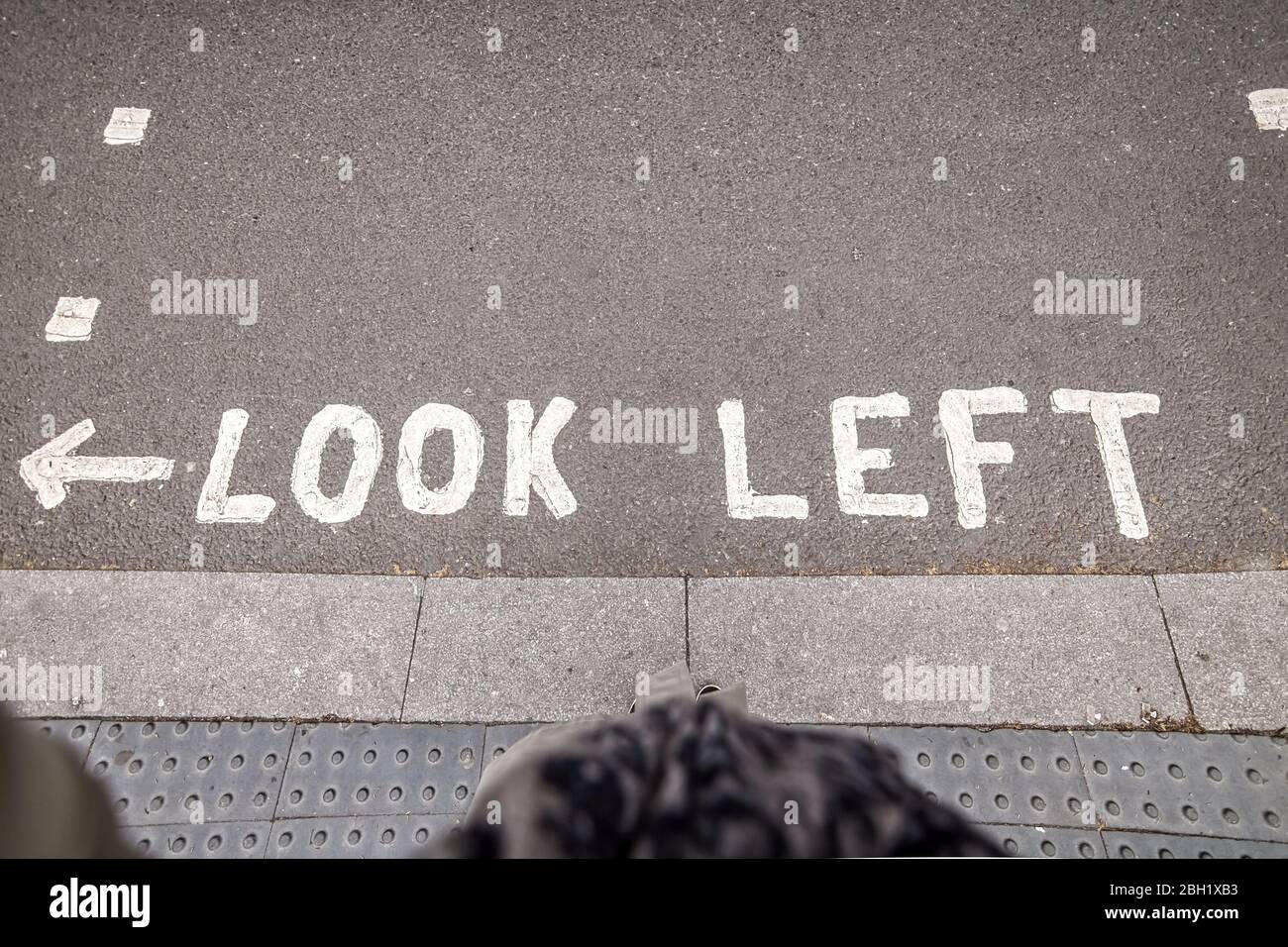 Pedestrian crossing look left sign hi-res stock photography and images ...