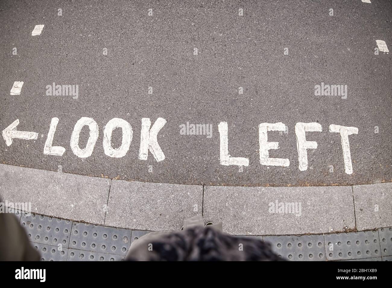 Pedestrian crossing look left sign hi-res stock photography and images ...