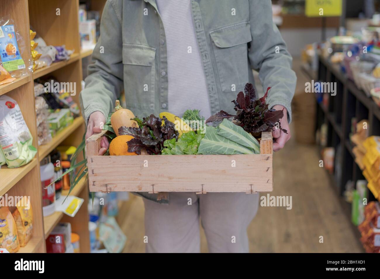 Close up man carrying crate hi-res stock photography and images - Alamy